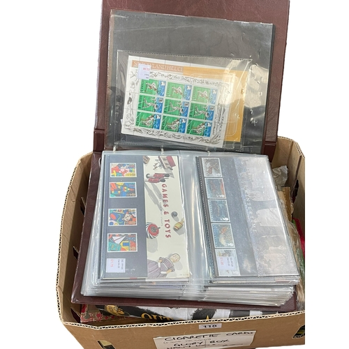 Leatherette album of stamp presentation packs, cigarette cards, tea ...
