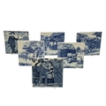 Four blue and white Minton tiles and two Wedgwood tiles.