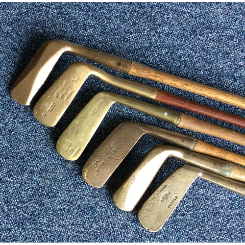 A brass mounted HICKORY golf putter by Abbey together with five other ...