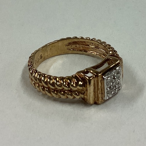 A small diamond cluster ring in 9 carat rope twist setting. Approx. 3 ...
