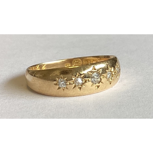 A good diamond five stone gypsy set ring in 18 carat gold mount. Approx ...