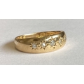 A good diamond five stone gypsy set ring in 18 carat gold mount. Approx ...