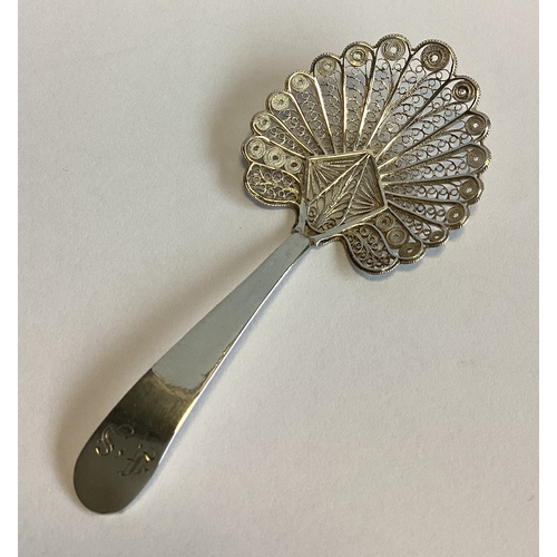 A good Georgian silver filigree caddy spoon with plain handle. London ...