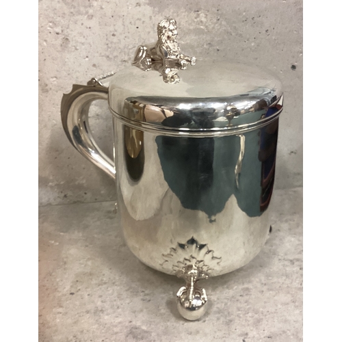 A large and impressive Victorian silver beer flagon with cast lion ...