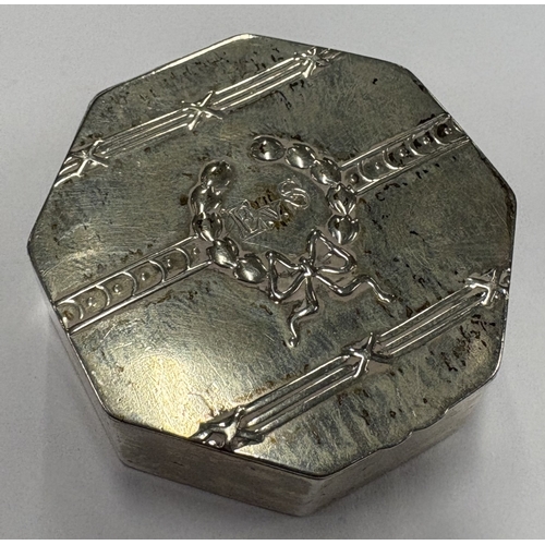 An octagonal silver pill box with swag decoration to hinged lid. Approx ...