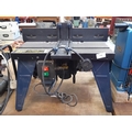A black and blue Powercraft PRT-150 router table with mounted PPF-1200 ...