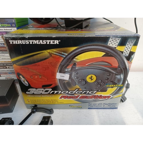 Three items, one boxed Thrustmaster 360 Modena Red Edition official Ferrari licensed product PS2 and
