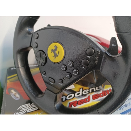 Three items, one boxed Thrustmaster 360 Modena Red Edition official ...
