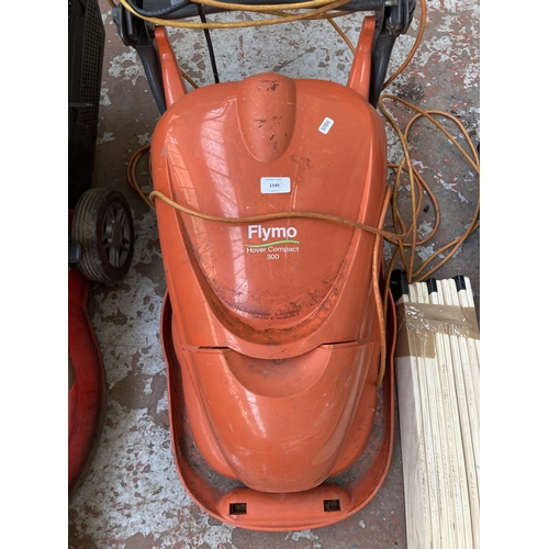 A Flymo Hover Compact 300 electric lawnmower