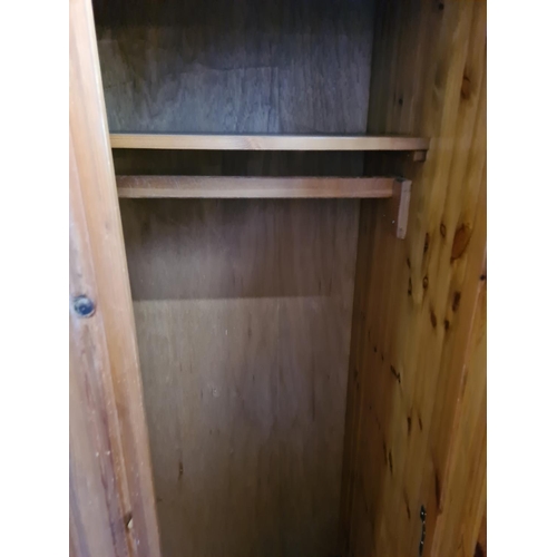 A modern pine double wardrobe - approx. 18cm high x 90cm wide x 60cm deep