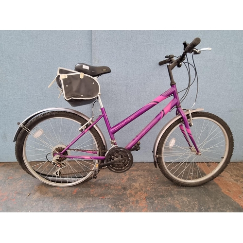 An Apollo Outrider ladies bike with an 18-speed Shimano gear system