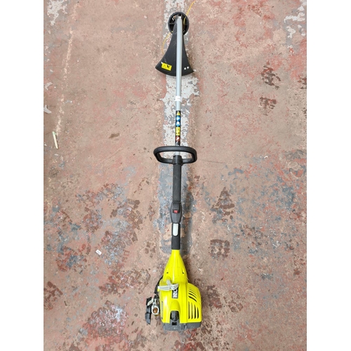 A Ryobi Powr LT2 petrol powered strimmer