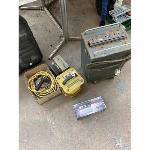 Five items, 110v transformer, boxed Tronic universal battery charger ...