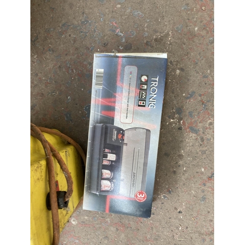 Five items, 110v transformer, boxed Tronic universal battery charger ...