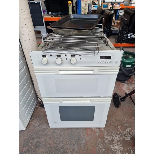 A Europa Solar Plus integrated cooker comprising fan oven and top oven ...