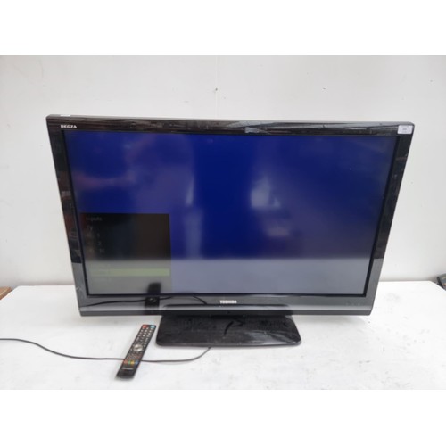 A Toshiba Regza 42RV635D 42" LCD TV with remote controls