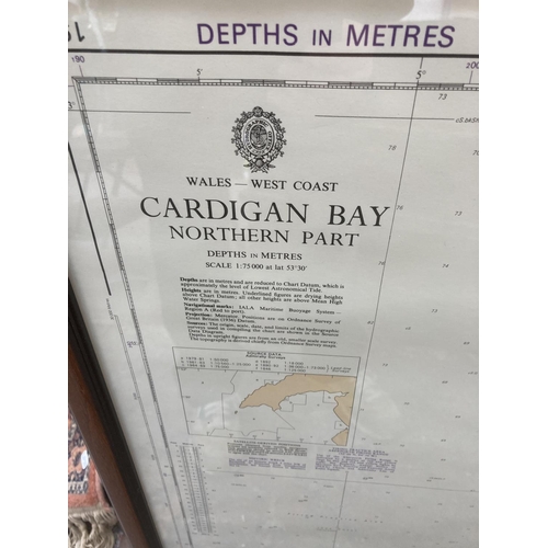 Two maps, one mahogany framed 1971 maritime chart of Cardigan Bay of ...