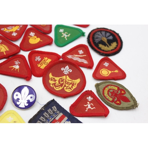 Twenty six assorted Boy Scouts pin badges and patches