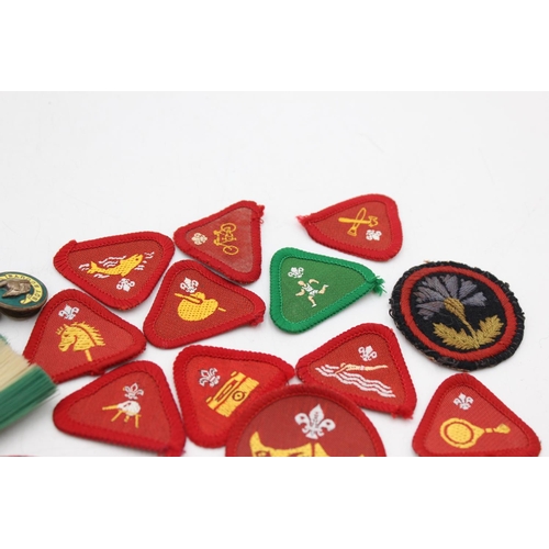 Twenty six assorted Boy Scouts pin badges and patches