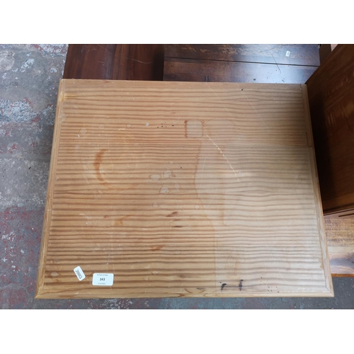 A modern solid pine stereo cabinet