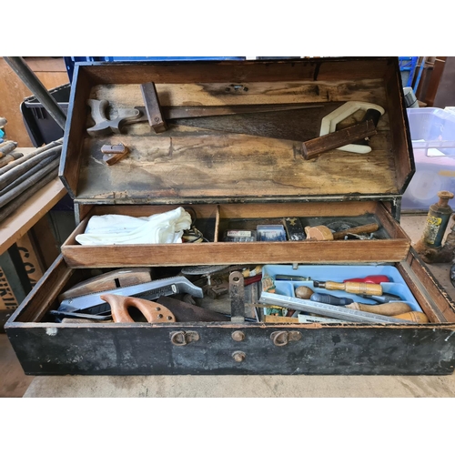 An early 20th century ebonised pine carpenters tool chest containing ...