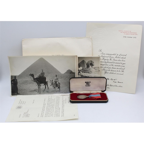 A boxed ER.II Imperial Service medal and certificate presented to Owen ...