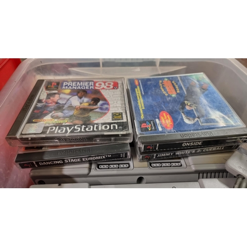 Six Sony PlayStation games consoles with games and accessories