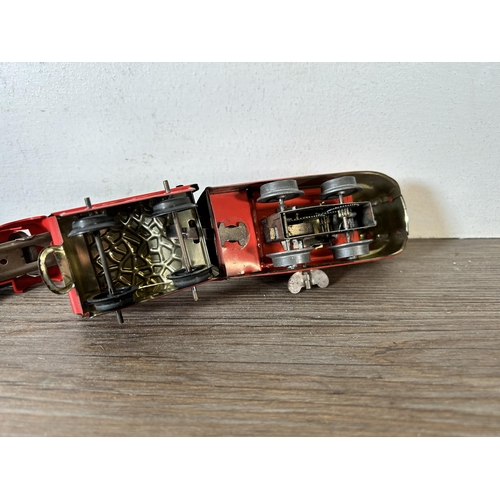 Four vintage tinplate model vehicles to include the Prince clockwork ...