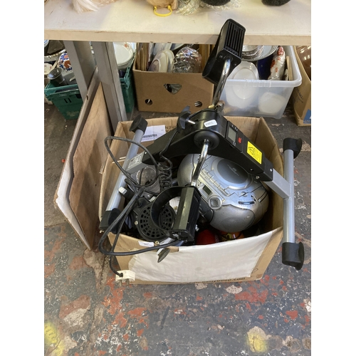 A box containing white metal serving tray, Mitre Pro Inflator 240v air ...