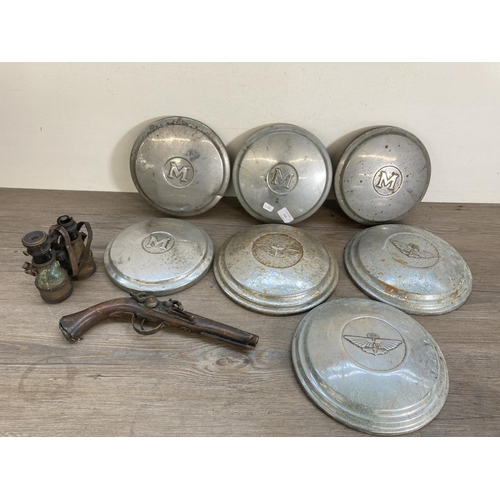 Nine items, four Morris Minor hub caps, three Austin Healey hub caps ...
