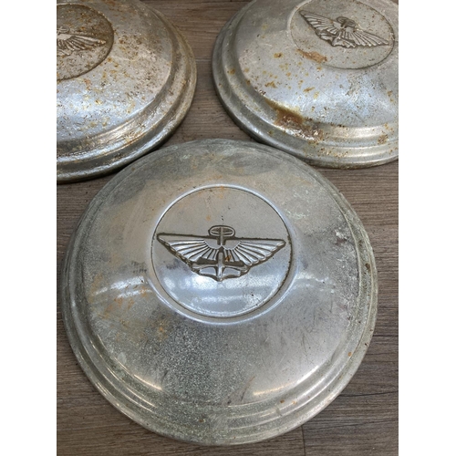 Nine items, four Morris Minor hub caps, three Austin Healey hub caps ...