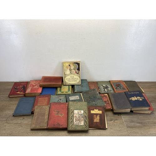 A collection of antique and vintage hardback books to include the ...