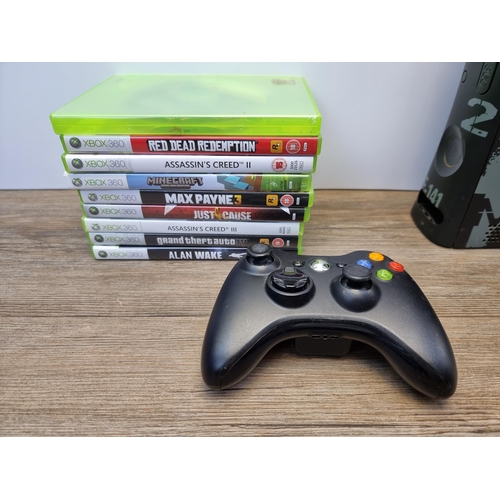 A Microsoft Xbox 360 Elite COD: MW2 limited edition console with games ...