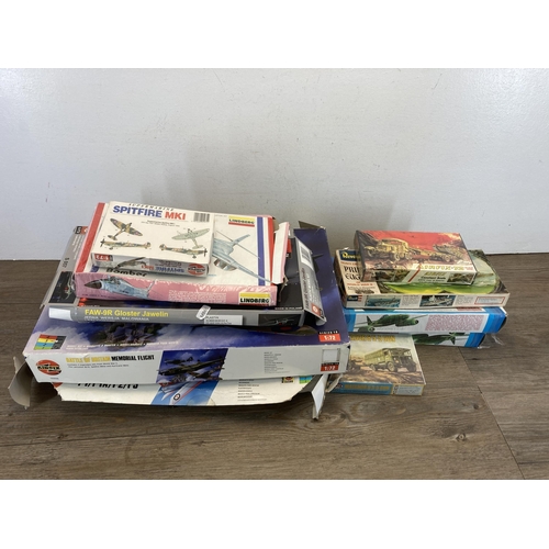 A collection of model building kits to include Airfix, Lindberg etc.