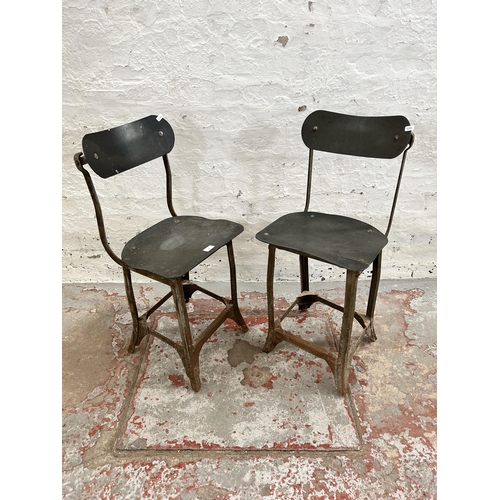 A pair of 1950s Tan-Sad style fibreboard and cast metal industrial ...