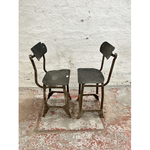 A pair of 1950s Tan-Sad style fibreboard and cast metal industrial ...