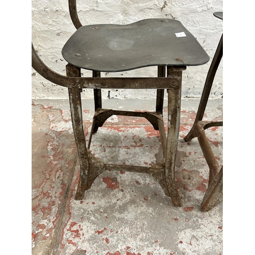 A pair of 1950s Tan-Sad style fibreboard and cast metal industrial ...