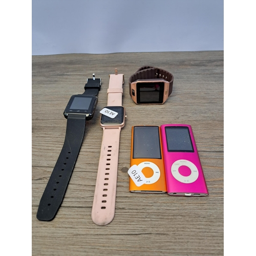 Five items, three smart watches and two mp3 players to include Apple ...