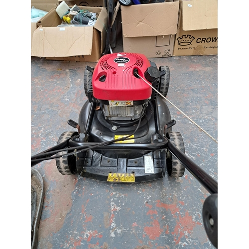 A Mountfield multi clip 50 petrol mulching mower with RV150 engine