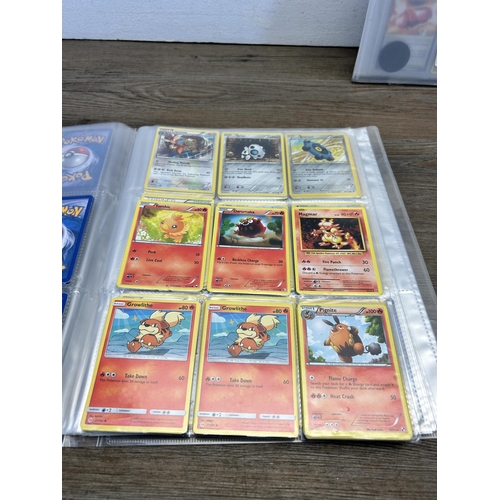 Two folders containing a large collection of various generation Pokémon ...