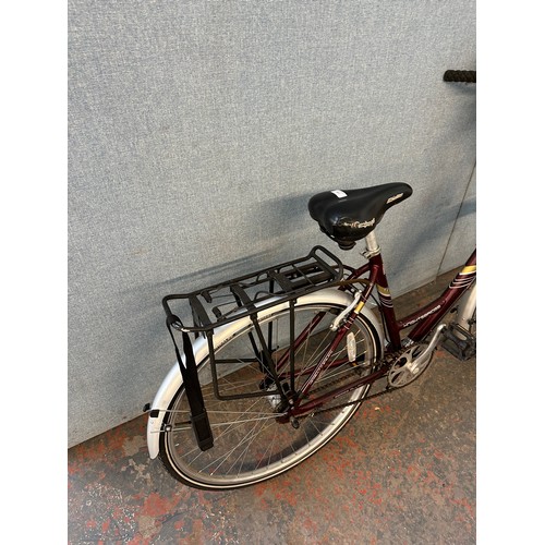 A Claud Butler Knightsbridge ladies bicycle with wicker basket front ...