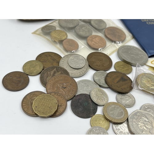 A collection of banknotes and coins to include 92.5% 1889 silver ...
