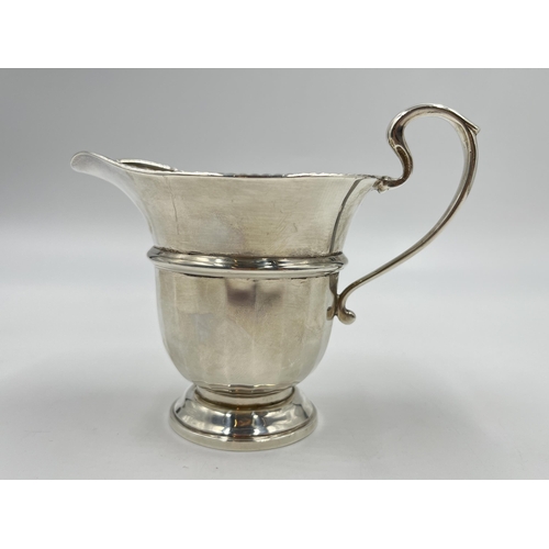A Goldsmiths & Silversmiths Co. Ltd. hallmarked London silver milk jug ...