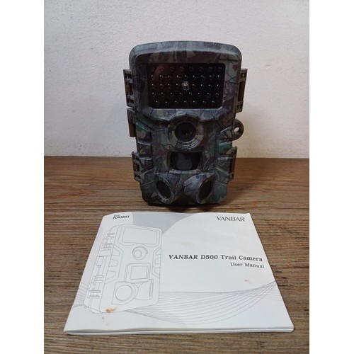 A boxed Vanbar D500 digital trail camera with instruction manual