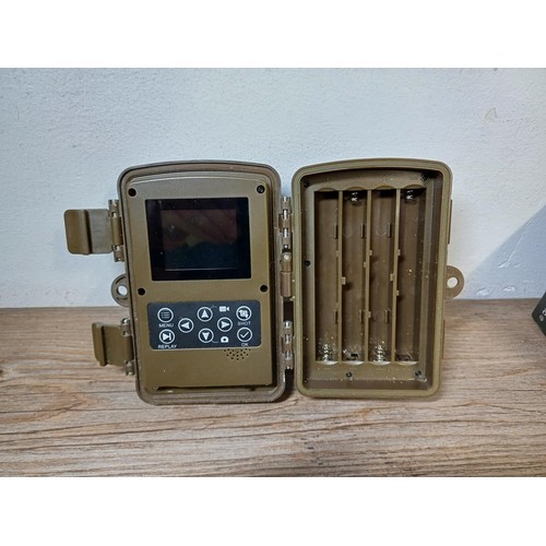 A boxed Vanbar D500 digital trail camera with instruction manual