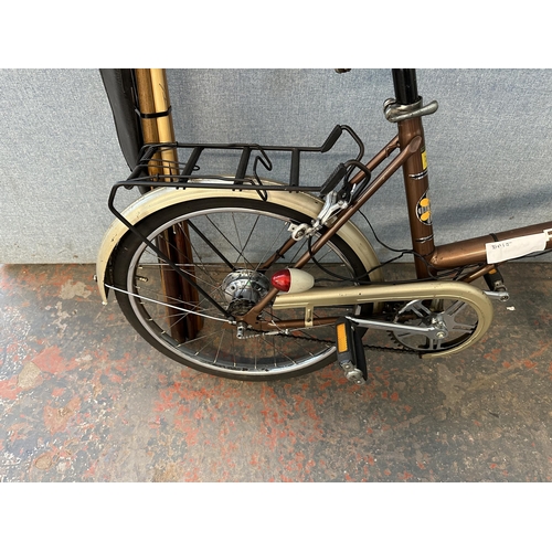 Two items, one vintage Puch Promenade 20 bike together with a ...