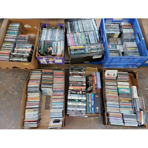 Seven boxes containing a very large collection of mixed media to ...