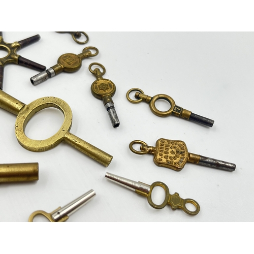 A collection of antique and later pocket watch and clock keys