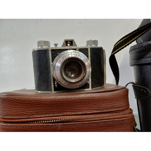 Two cased items, one Neidig Perlux 35mm camera fitted with Staeble ...