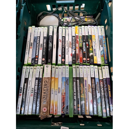 A collection of Microsoft Xbox 360 items to include two consoles - one ...